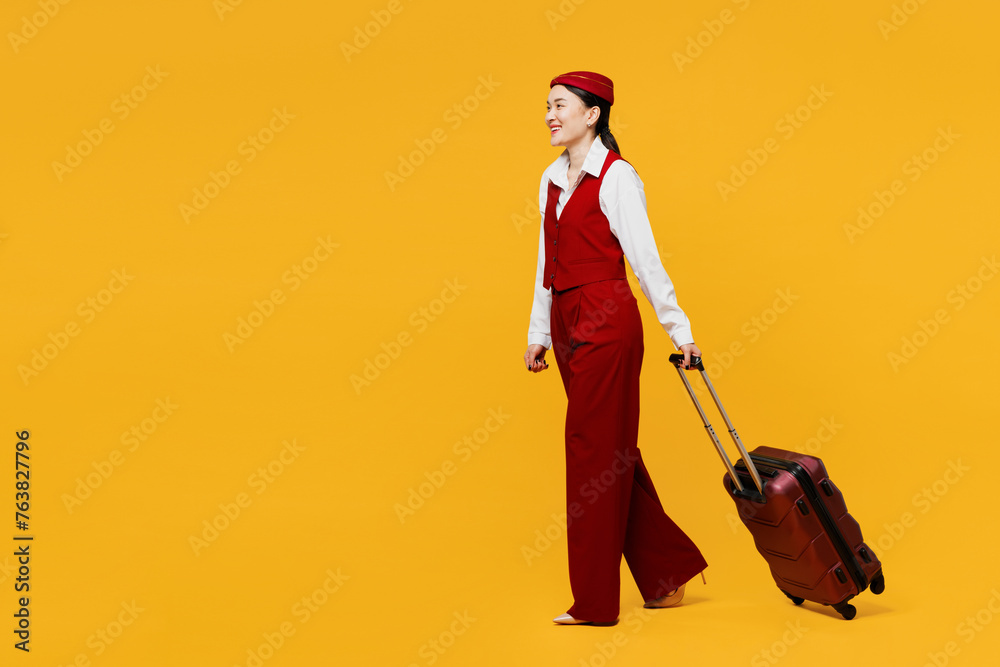 Full body young stewardess flight attendant woman of Asian ethnicity ...
