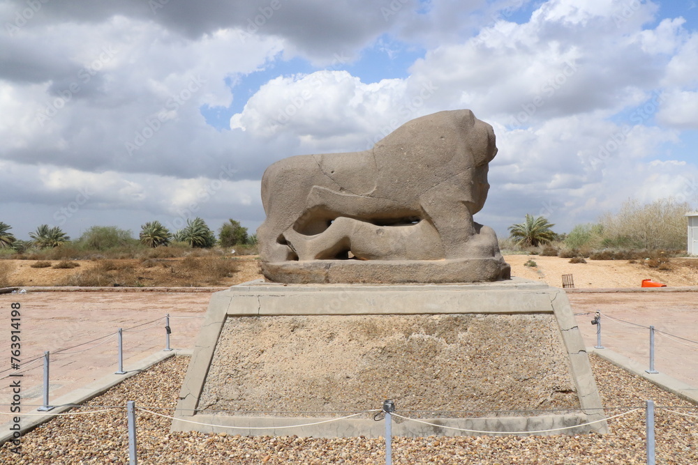 Several perspectives of the Lion of Babylon statue in the ancient city ...