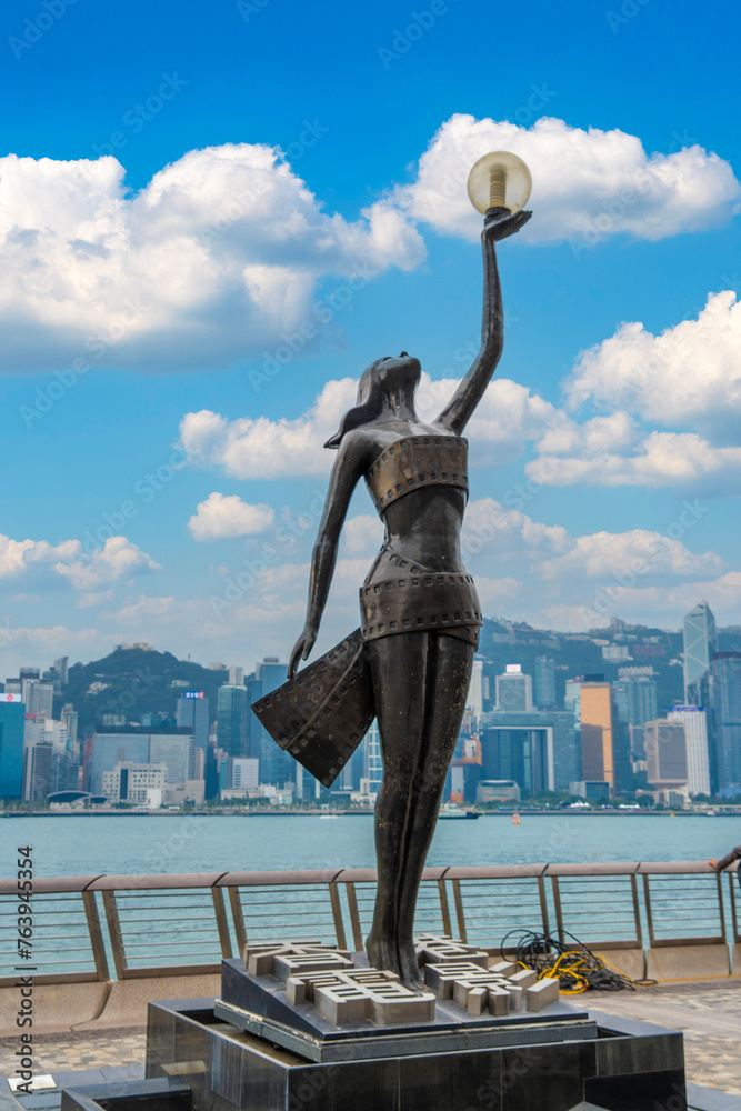 Bronze statue of Hong Kong Film Awards and skyline in Avenue of Stars ...