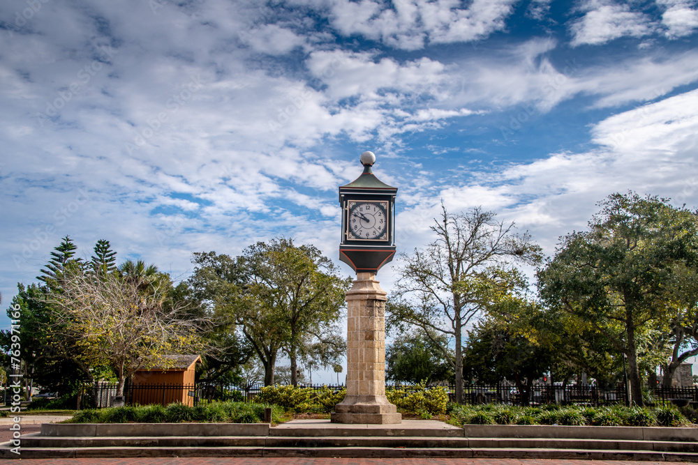 Clock Tower outside with blue skies, clouds, in historic downtown St ...