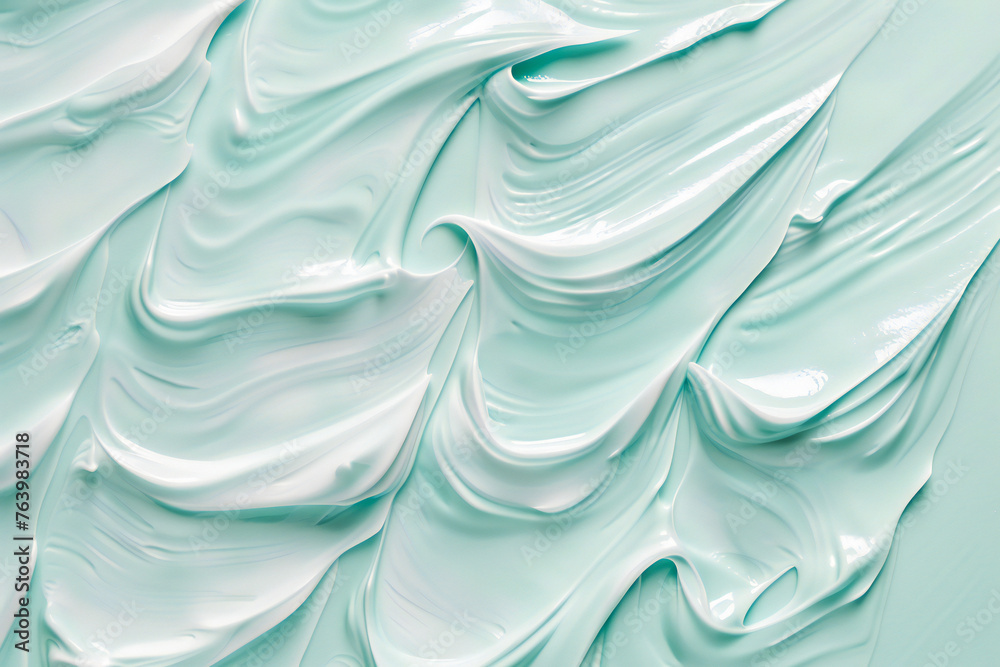 Moisturizing texture in a creamy, wave-like texture on a light pastel ...