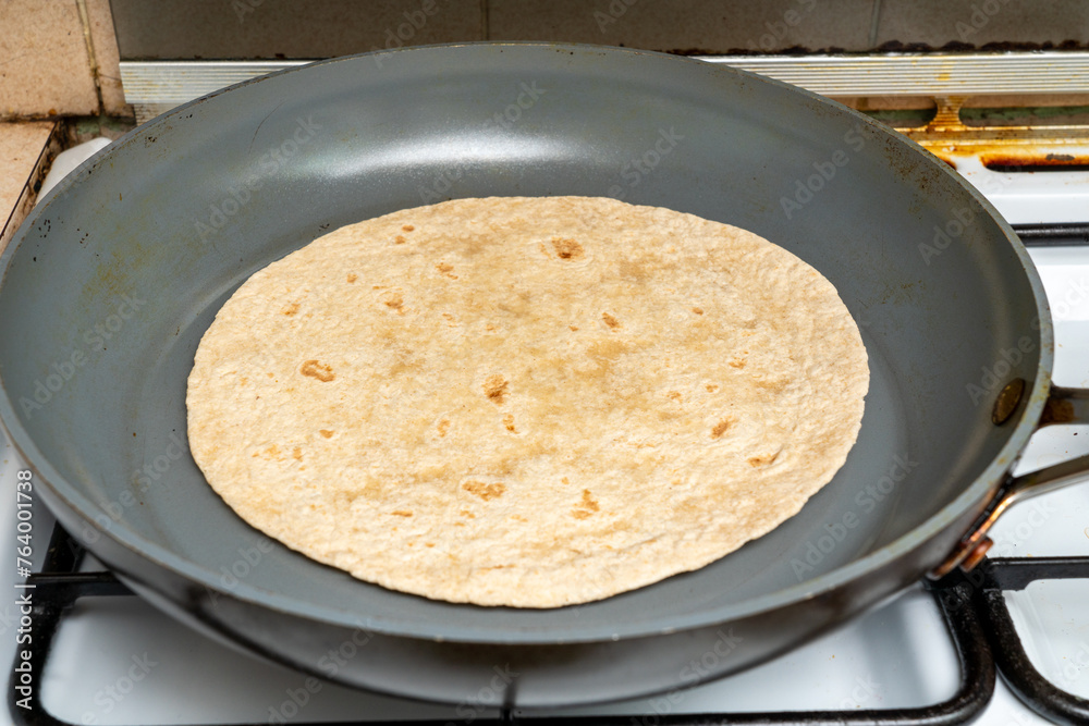 Round Indian flat bread, roti or chapati made from unleavened dough ...