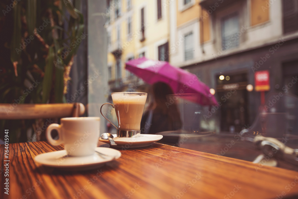 Coffee cup in coffee shop. Coffee latte on the wood desk in coffee shop ...