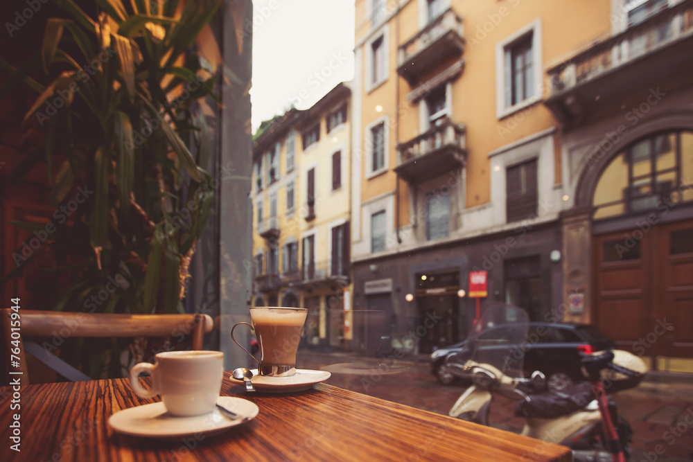 Coffee cup in coffee shop. Coffee latte on the wood desk in coffee shop ...