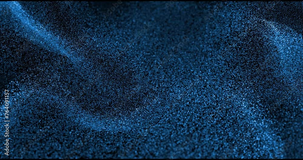 Particles flowing in a smooth, wave-like motion, creating a mesmerizing ...