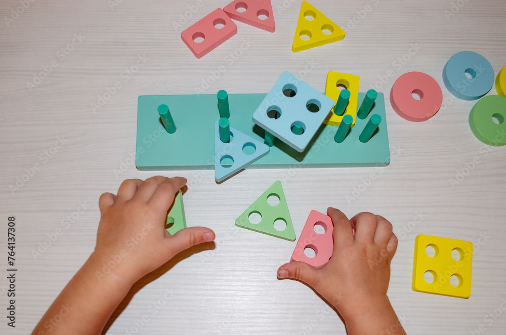 Baby hand playing wooden educational teaching aids Intelligence game ...