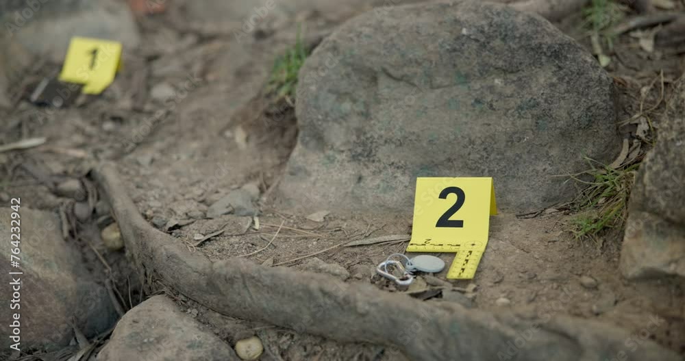 Closeup, evidence marker and forensic for investigation at crime scene ...