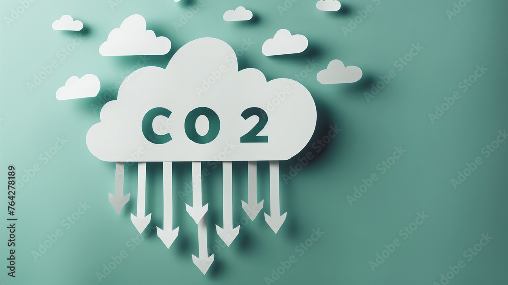 Paper cutout "CO2" cloud with downward arrows on green, symbolizes ...