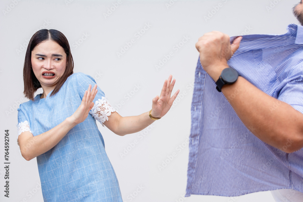 Asian woman expressing shock and disgust at man's indecent exposure ...
