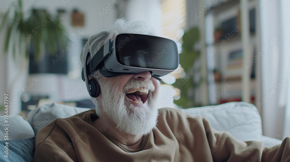 Happy old man wearing VR glasses on sofa in living room with modern ...