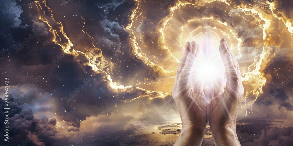 Male hands cupped reaching upwards with beautiful starlight between ...