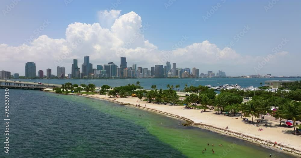 Miami Brickell in Florida, USA and Hobie Island Beach with people ...