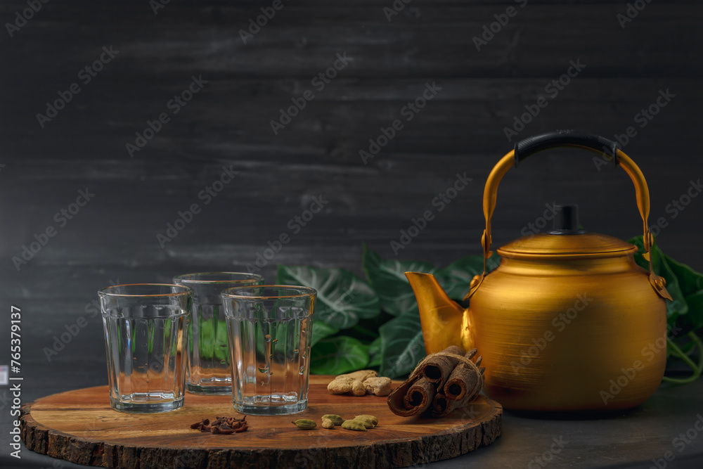 Fresh milk masala tea or Indian Kadak Chai. Herbal tea in glass cups ...