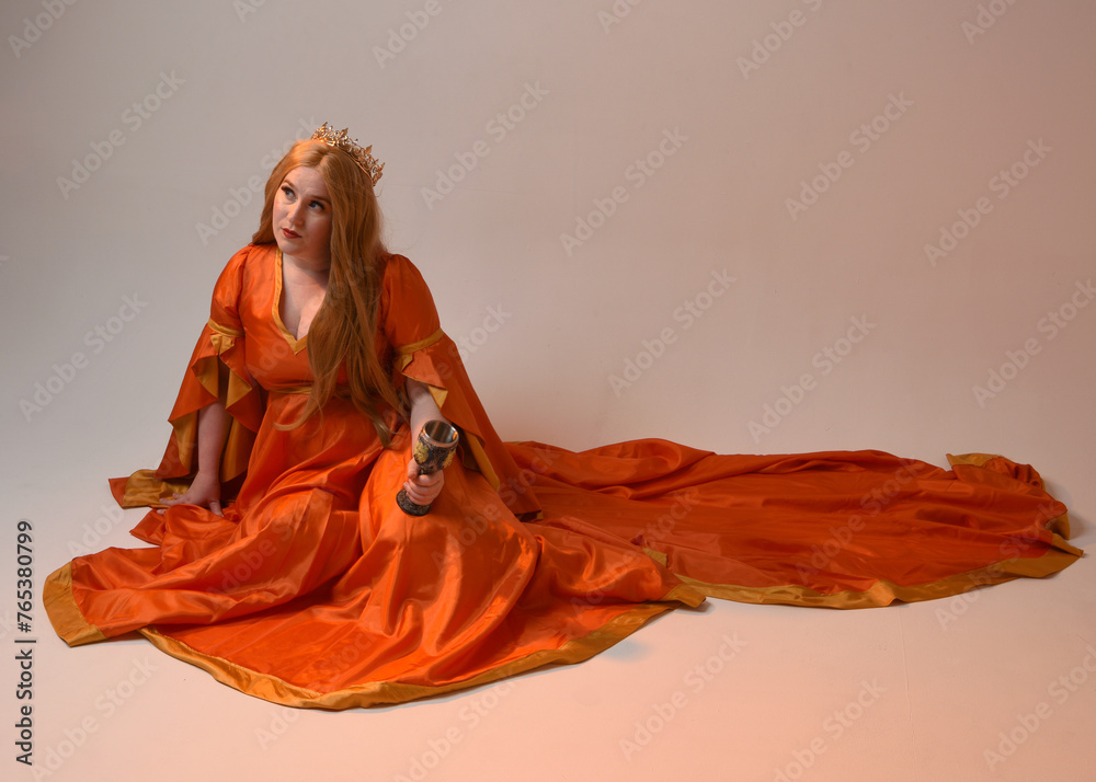 Full Length Portrait Of Plus Size Blonde Woman Wearing Historical