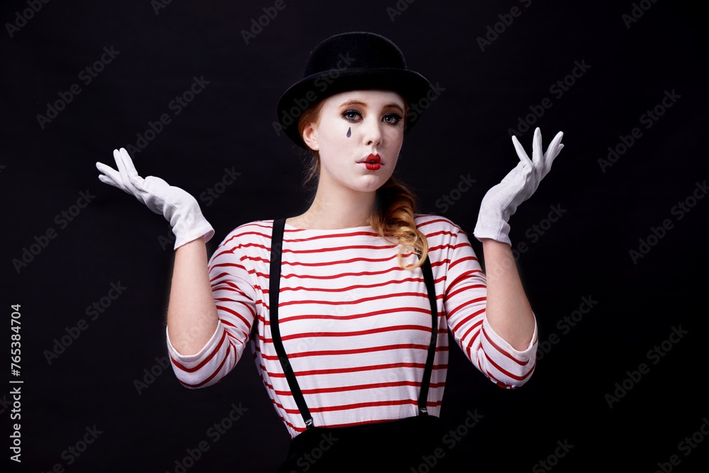 Woman, costume and mime for performance in studio on dark background ...