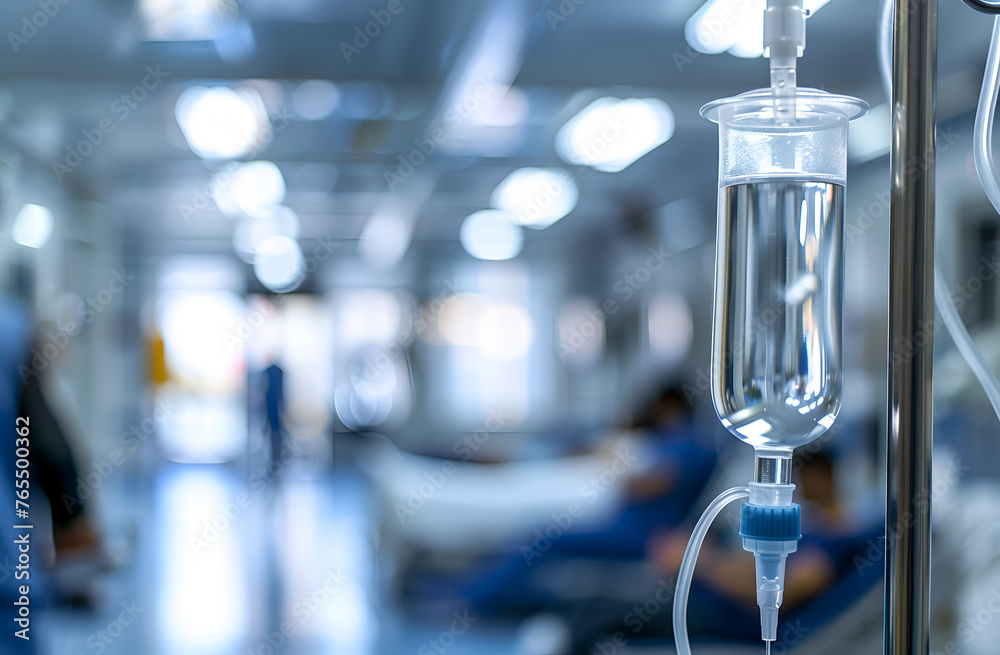 Intravenous rehydration, IV drip in hospital, IV bag filled with clear ...