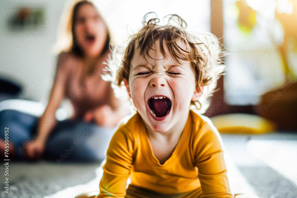 Foto de Child having tantrum. Kid screaming and angry mother. Mom ...