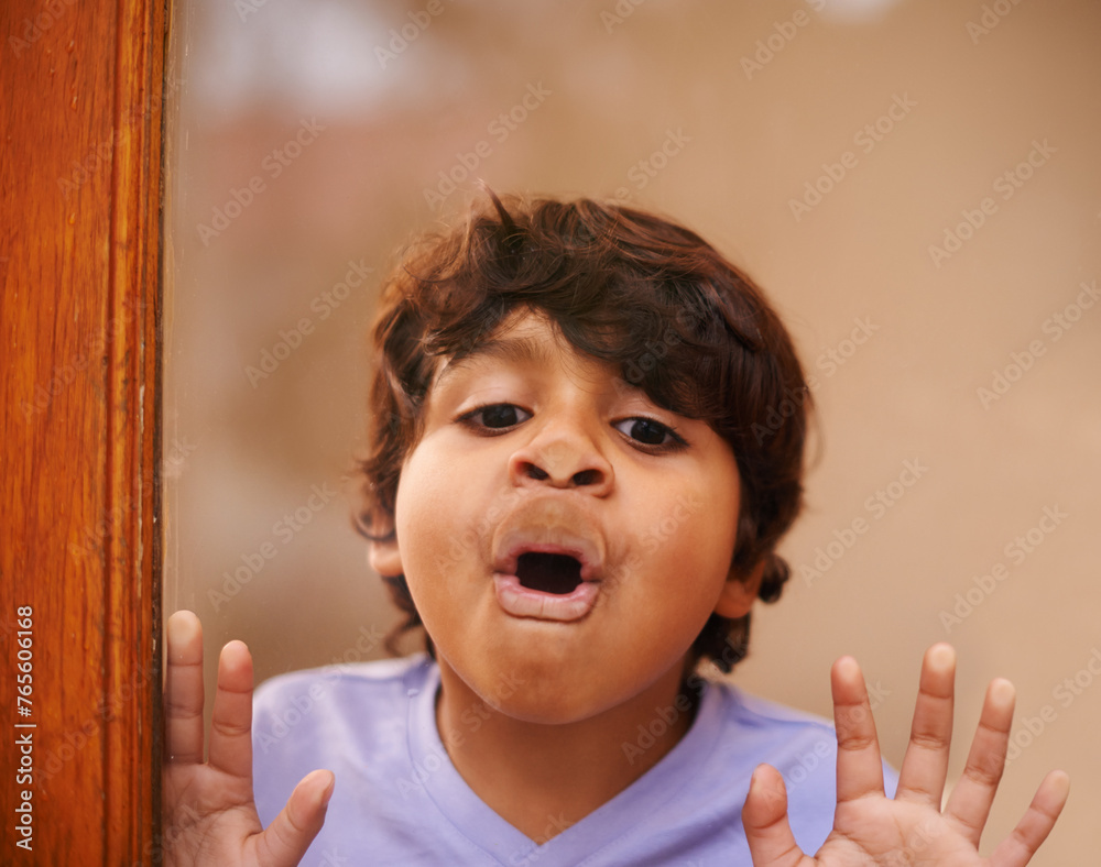 Window, face and funny kid with nose press comic in his house with ...