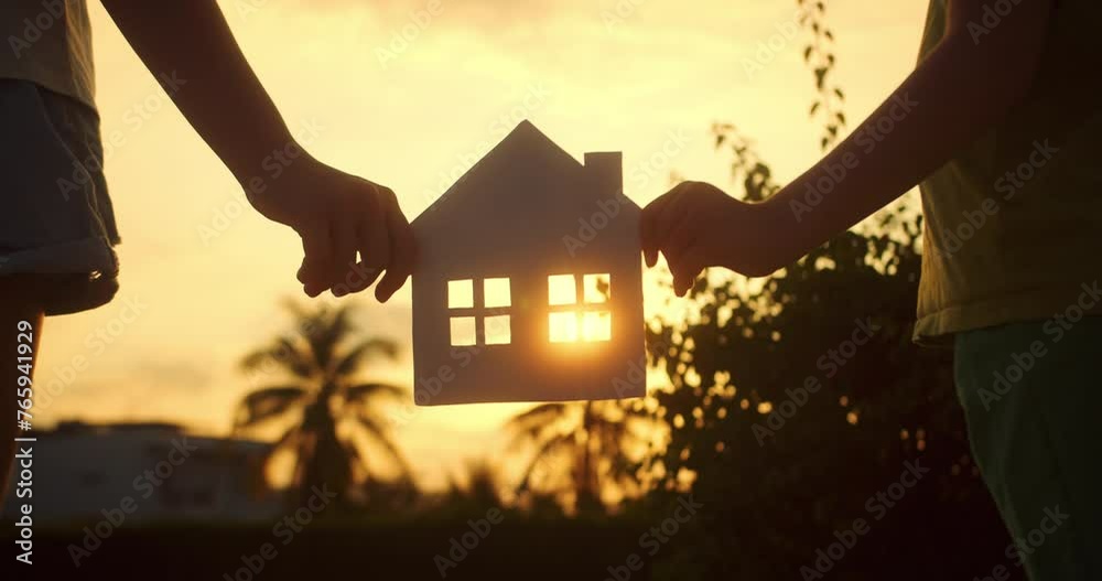 Symbol of the home, happiness. Concept of building a house for a family ...
