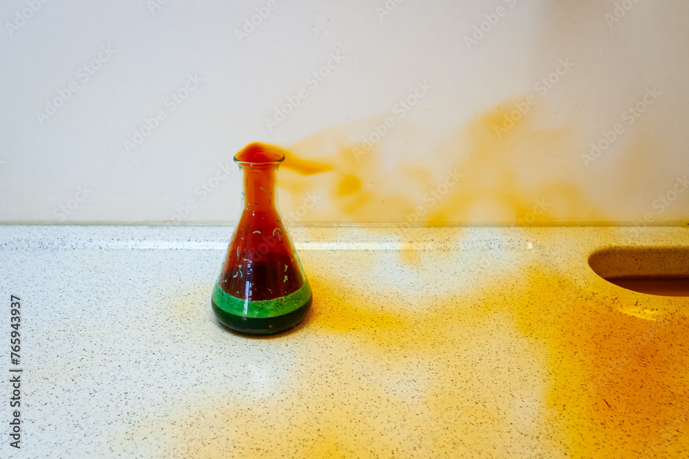Chemical experiment in which Nitric acid (HNO3) is placed in an ...