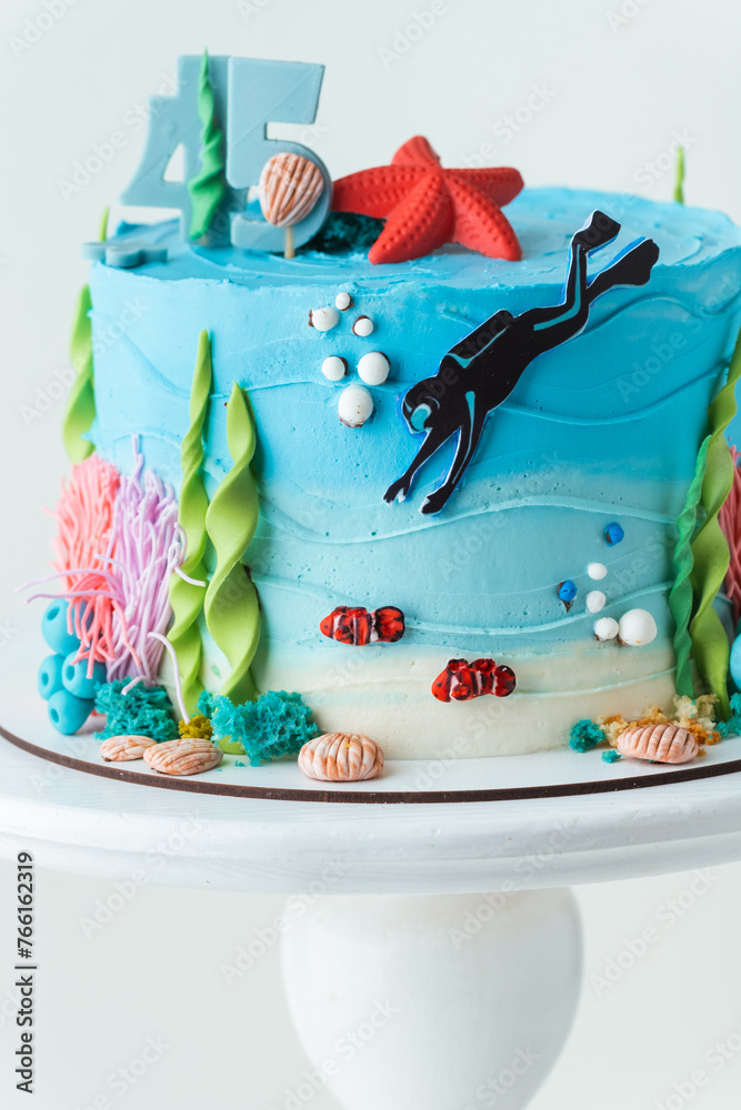 Sea themed summer cake for a mariner with blue chocolate frosting ...