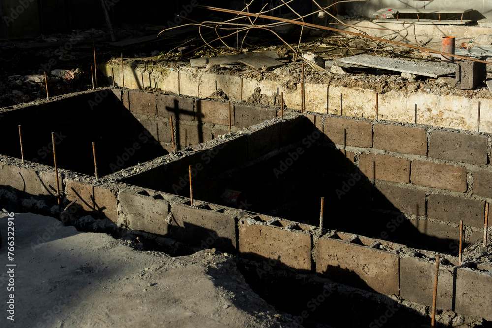 CHB septic tank under construction at a residential building site, with ...