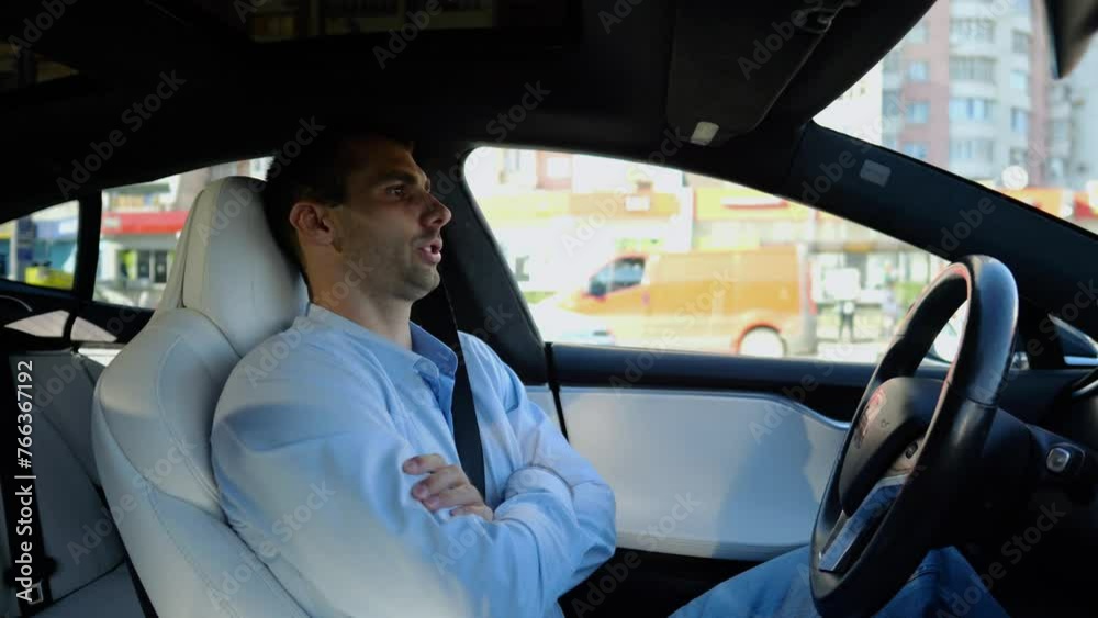 Male businessperson experience to ride an autonomous self driving ...