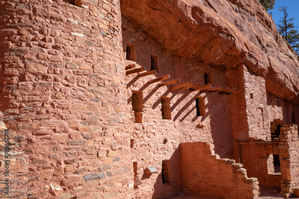 Red rocks of Manitou Springs cliff dwellings. Natural adobe walls with ...