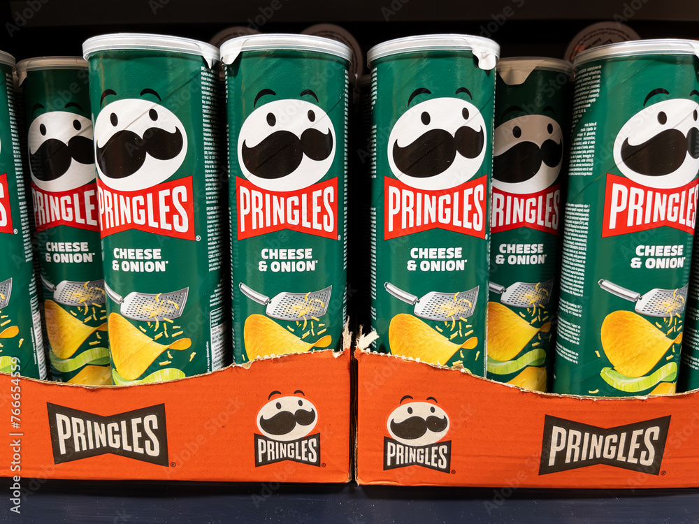 Pringles Chips Cans with Mustache Design on Shelf Stock Photo | Adobe Stock