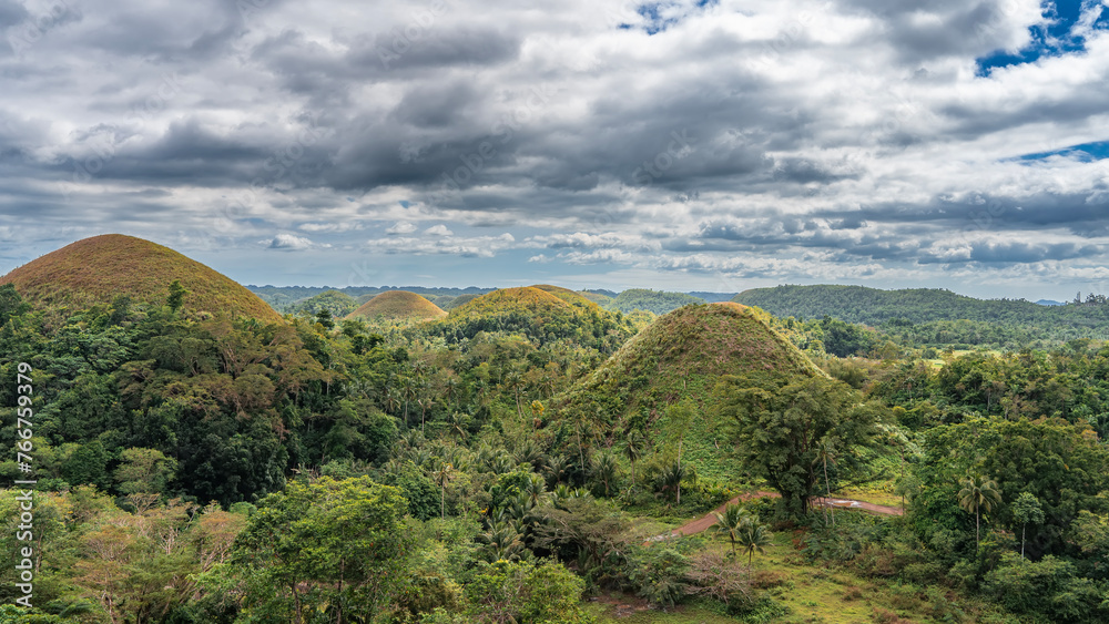 Unique hills stretch to the horizon. Many rounded conical karst ...