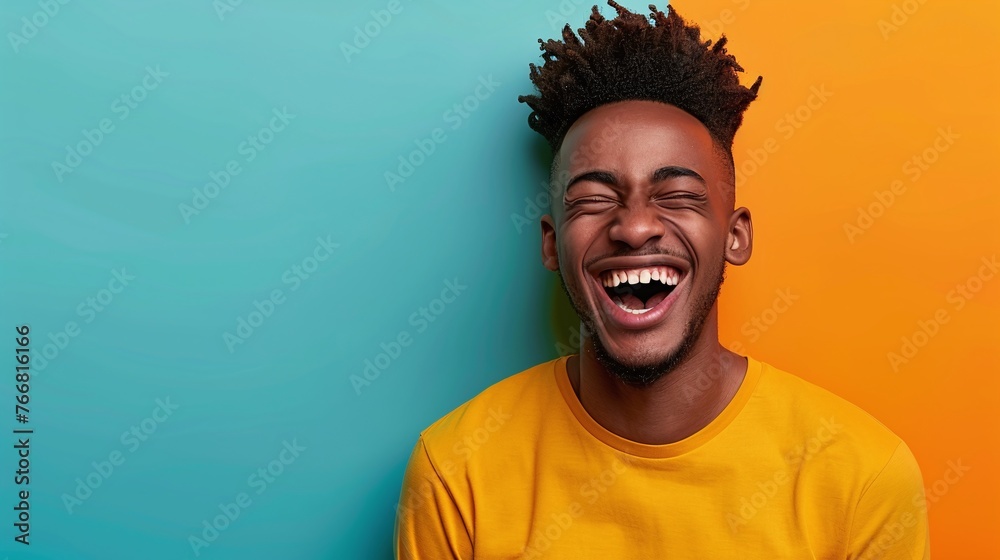 Foto de unshaven dark-skinned young male laughing at hilarious meme on ...