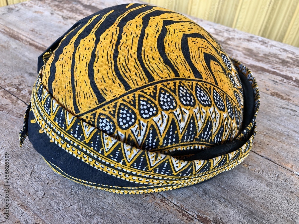 Blangkon is a traditional head covering or hat from Java, Indonesia ...