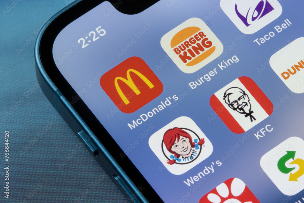 Portland, OR, USA - Mar 23, 2024: Assorted fast food apps, including ...