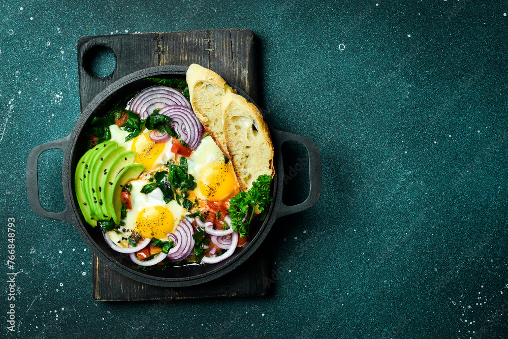 Shakshuka in a frying pan. Healthy delicious breakfast. Top view ...