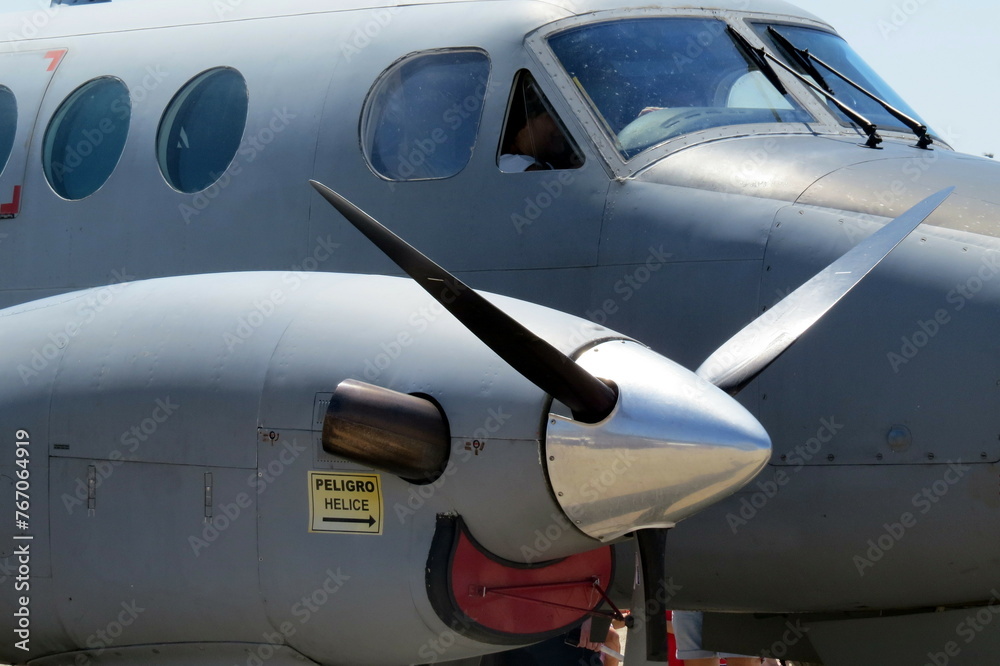 twin-engine propeller airplane zoom cockpit military transport fly gray ...