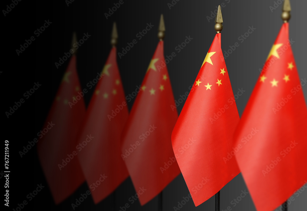 Row of Chinese flags on a dark background in perspective Stock Photo ...