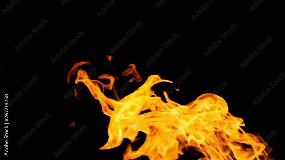Slow-motion video of fire and flames.A fire pit, burning gas or ...