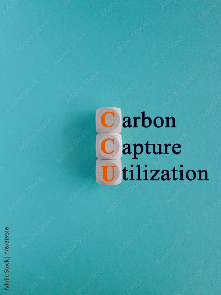 CCU (Carbon Capture and Utilization ) on wooden cubes on blue ...