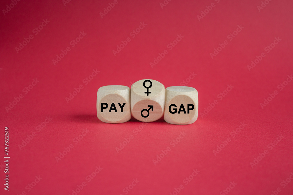 Pay gap symbol. Wooden cubes form the expression pay gap. Gender ...