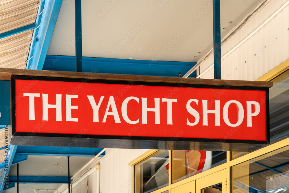 Denarau Island, Fiji - March 1, 2024: A The Yacht Shop hanging sign ...