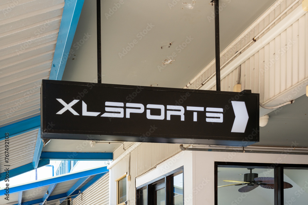 Denarau Island, Fiji - March 1, 2024: A XL Sports hanging sign outside ...