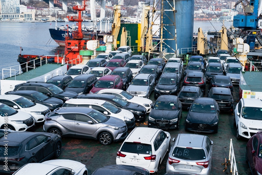 Vladivostok, Russia - 3 March 2024: unloading of new car from the ship ...