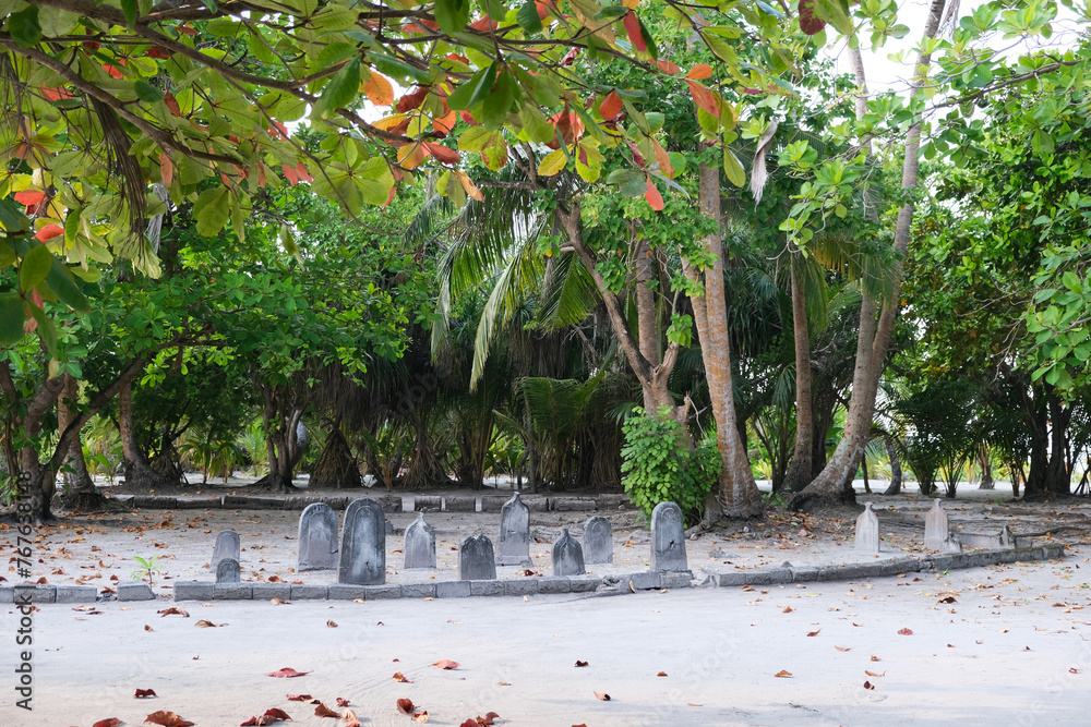 The graveyard with stone tombs for local villager at Mathiveri ...