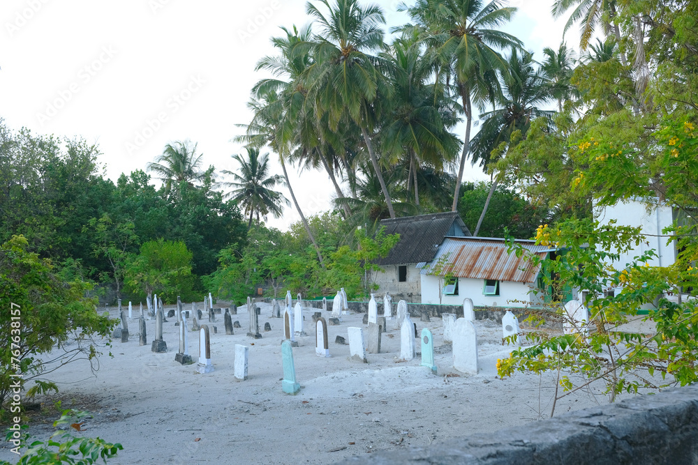 The graveyard with stone tombs for local villager at Mathiveri ...