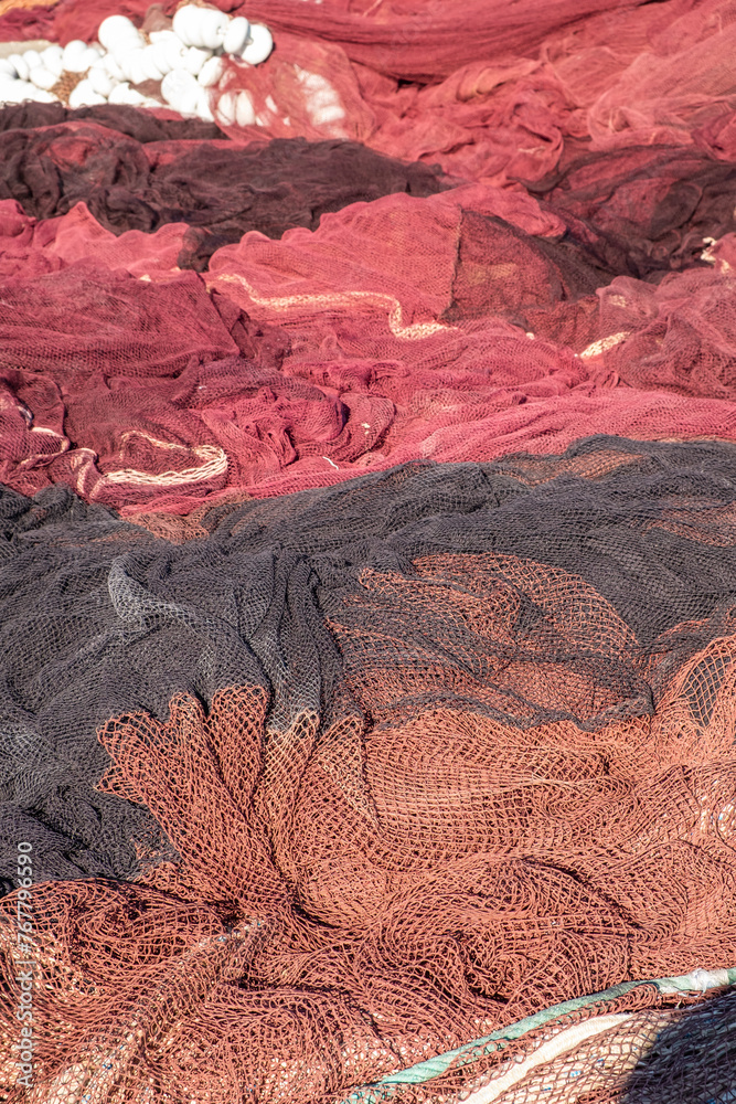 Fishing nets is a net used for fishing. Nets are devices made from ...