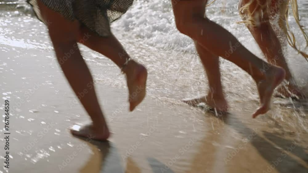 Barefoot group caucasian men, women legs feet run on sunny tropical ...