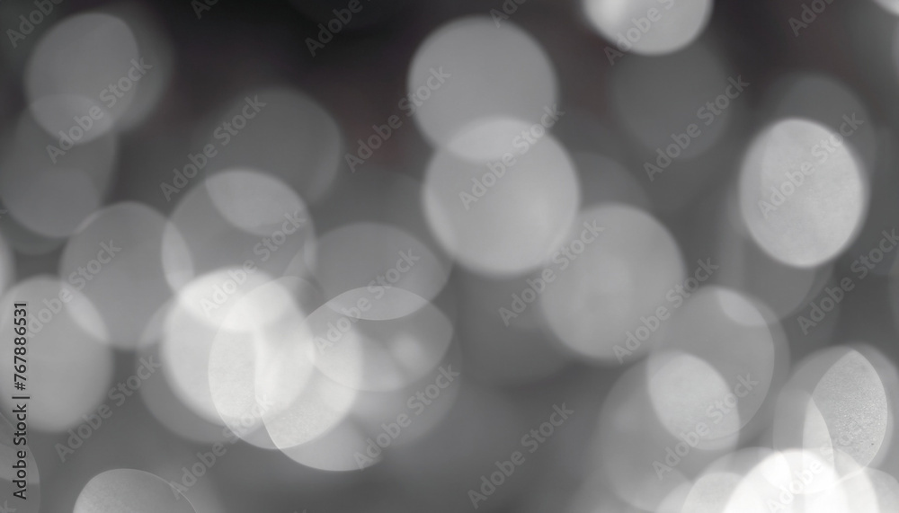 Abstract white and gray bokeh lights background with blurring lights ...