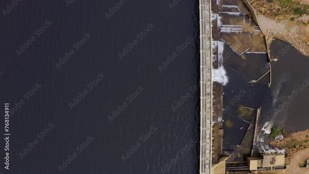 Drone, dam with water and barrier for infrastructure, industrial ...