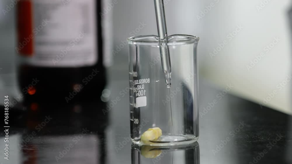 Close up scientist mixing chemicals conducting experiment science ...