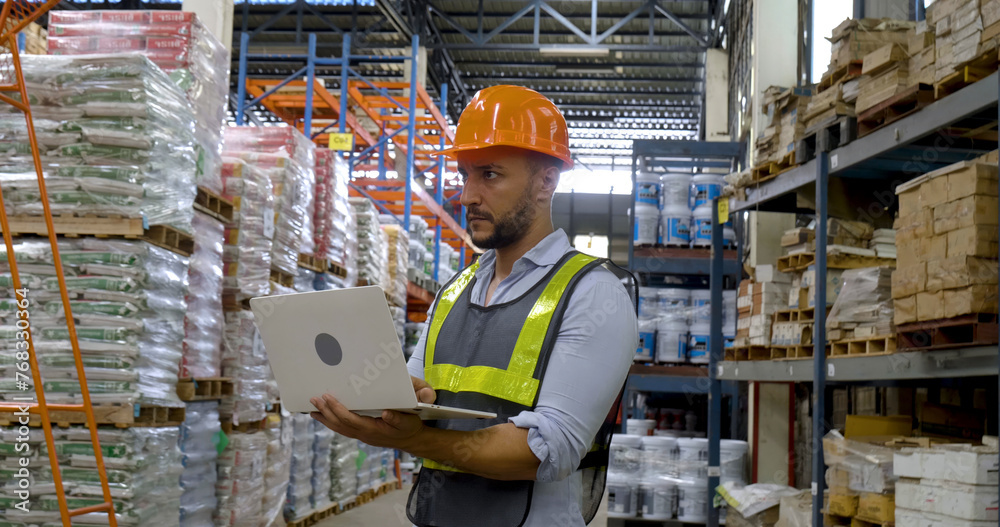 Hispanic men hands using typing laptop computer Warehouse management ...
